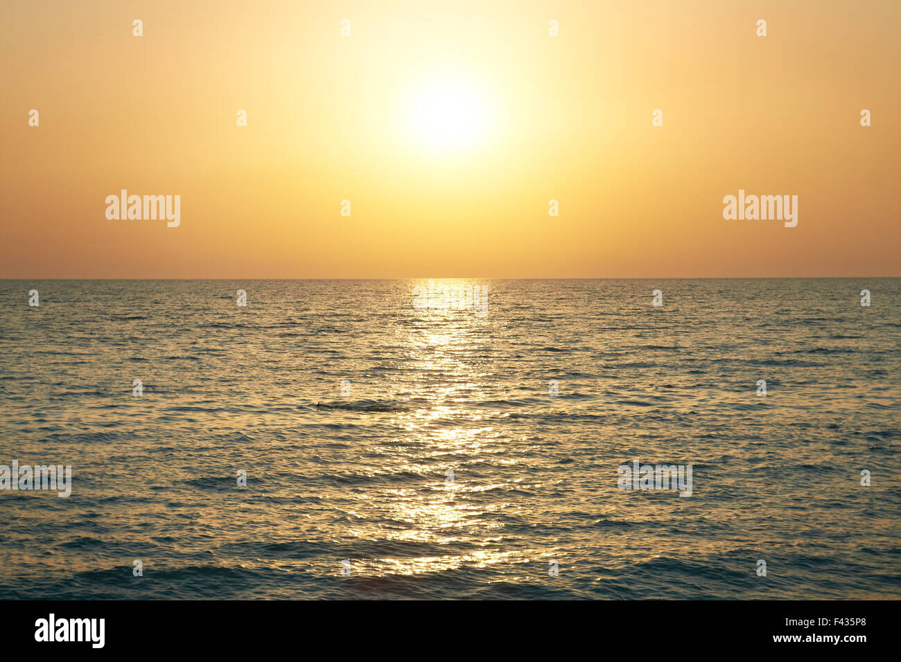 Abstract sunset above sea hi-res stock photography and images - Alamy
