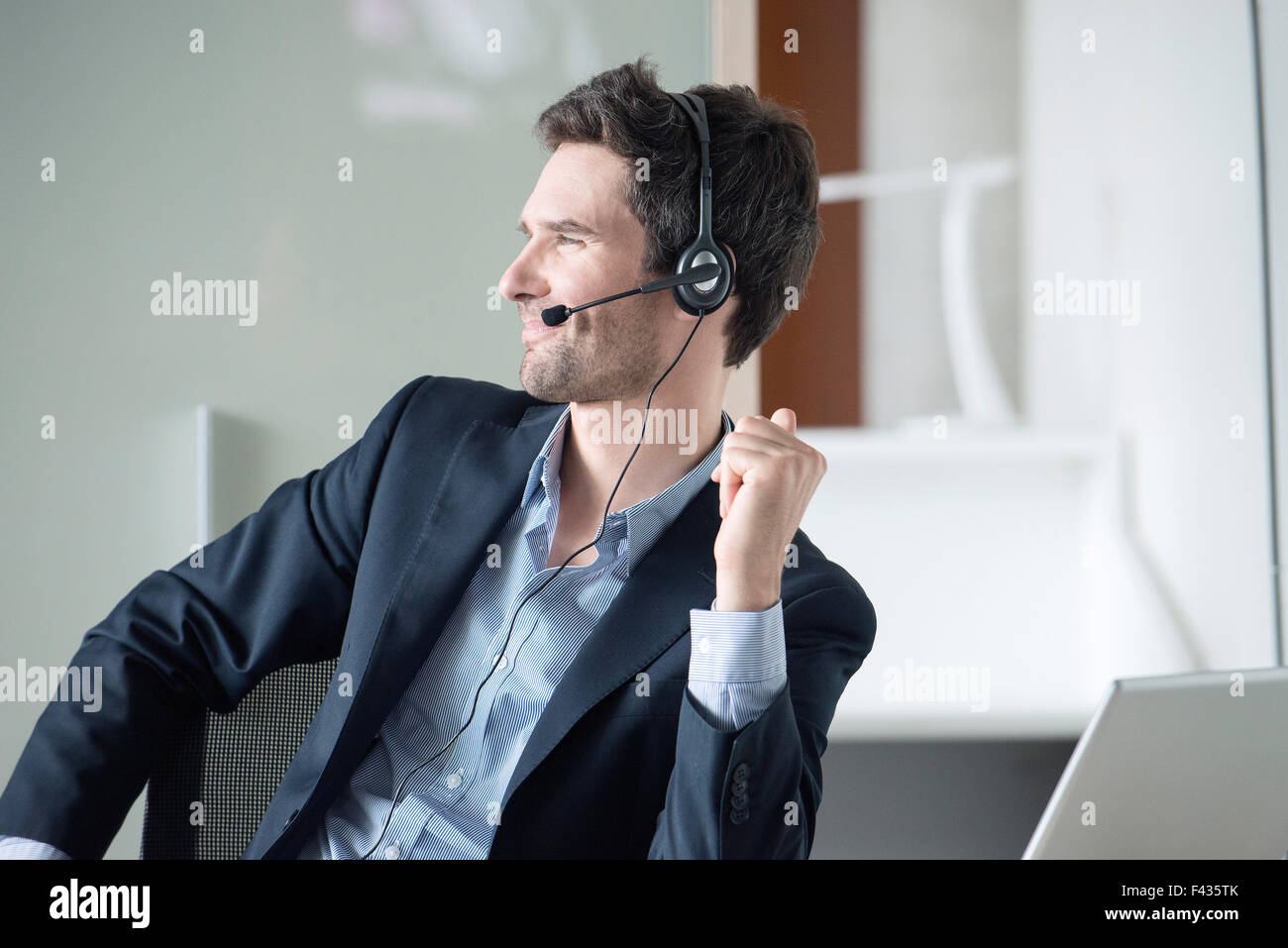 Salesman on phone call Stock Photo - Alamy