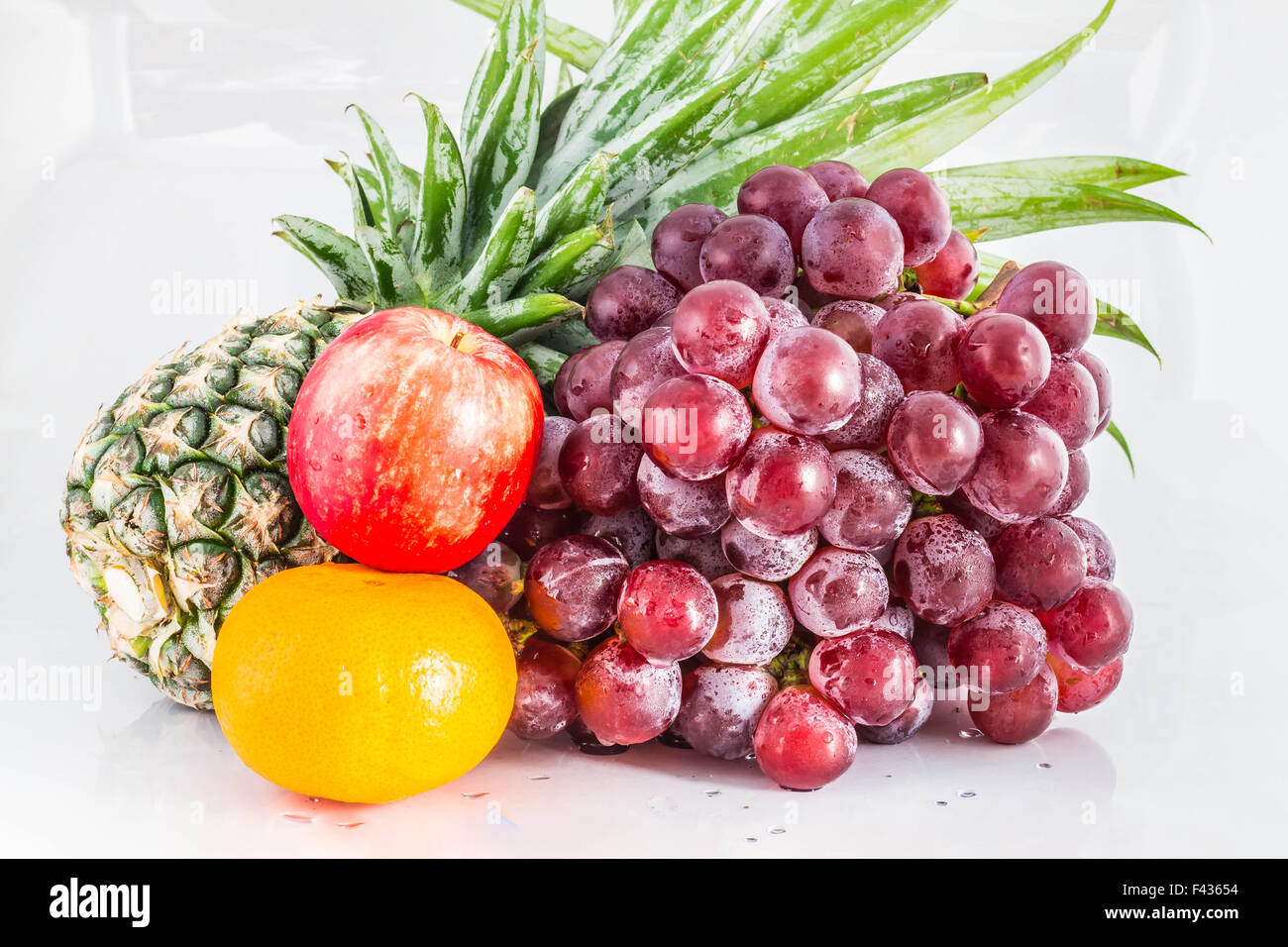Apple and assorted fruits on isolated background Stock Photo - Alamy