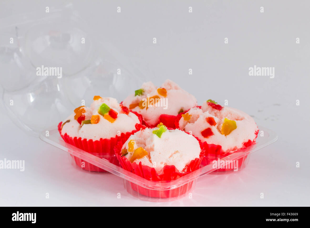 Chinese pay respect candy in a plastic box Stock Photo - Alamy