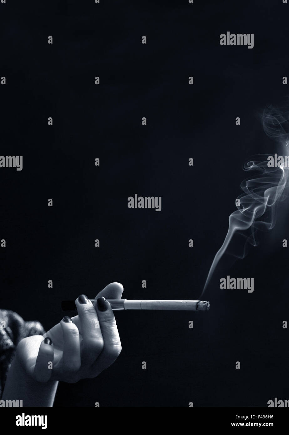 Hand with a cigarette Stock Photo - Alamy
