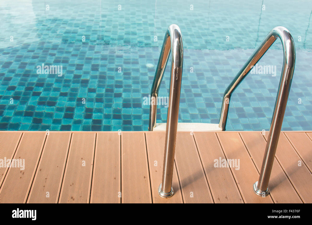 Steel for the handle up and down the pool Stock Photo - Alamy