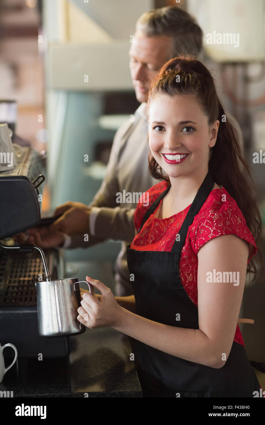 Barista making a cup of coffee Stock Photo - Alamy