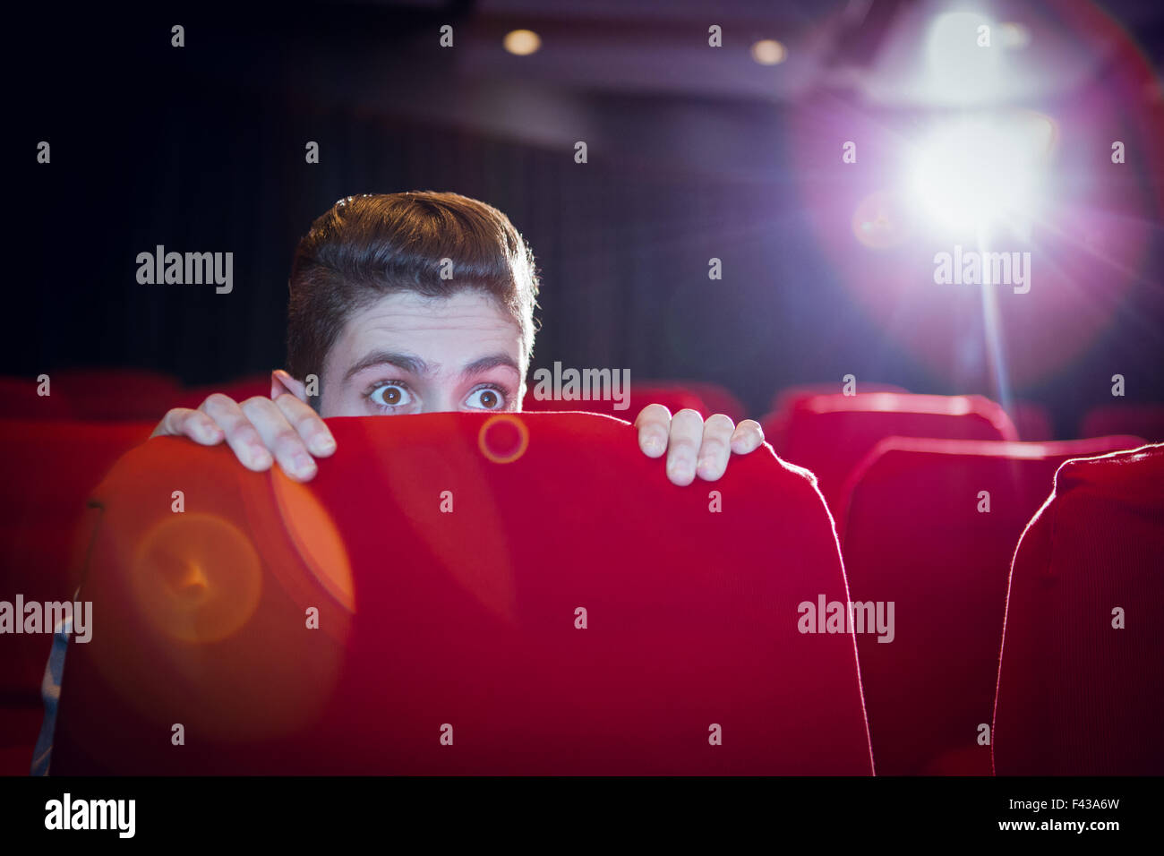 Watching scary film cinema hi-res stock photography and images - Alamy