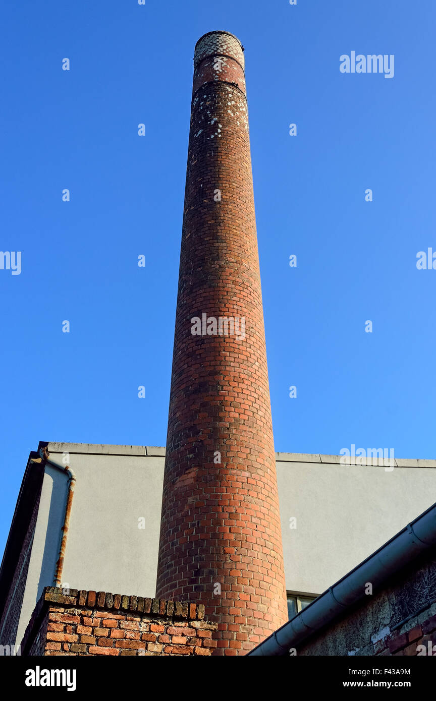 Chimney of an old factory Stock Photo - Alamy