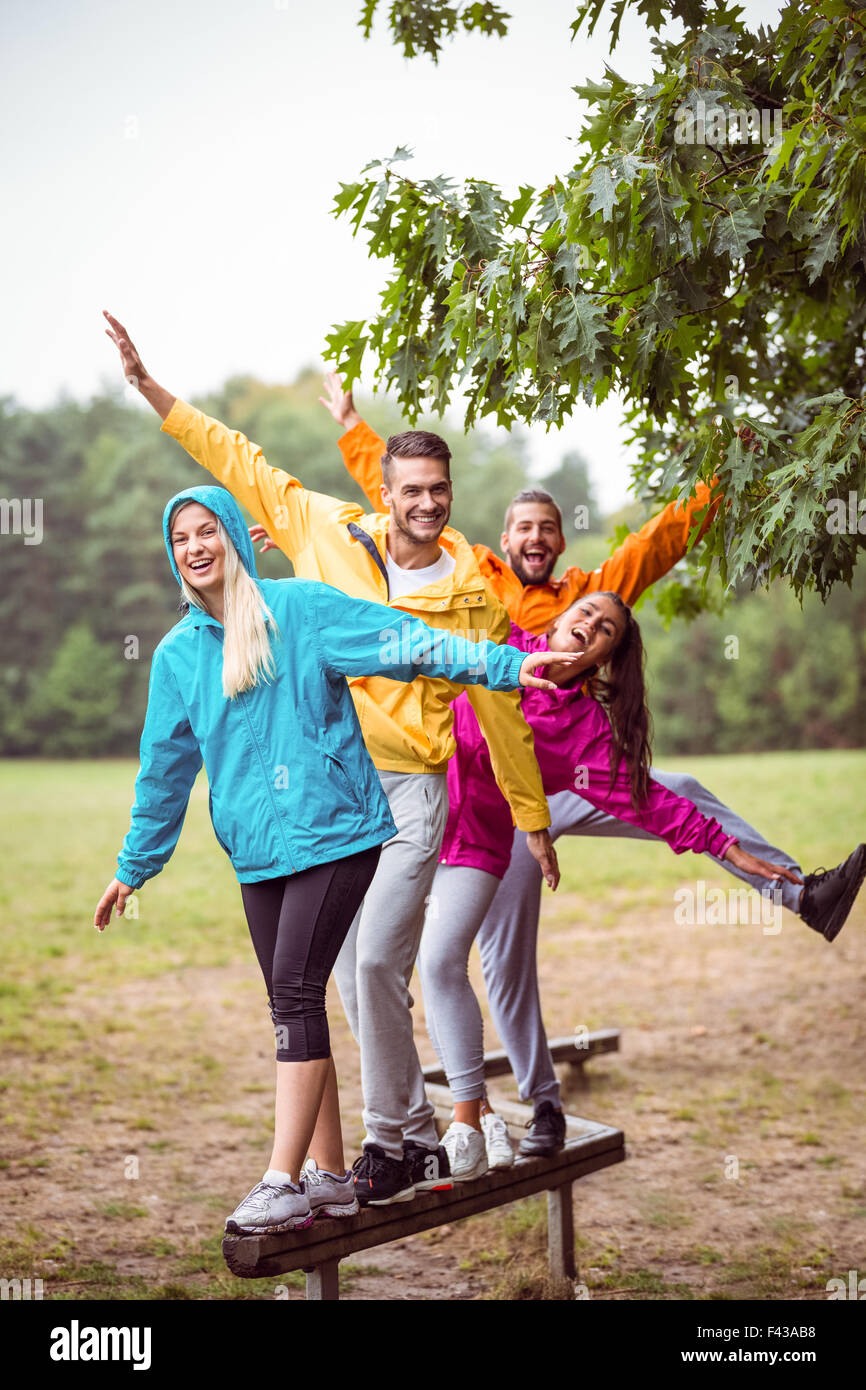 Happy friends having fun on a hike Stock Photo - Alamy