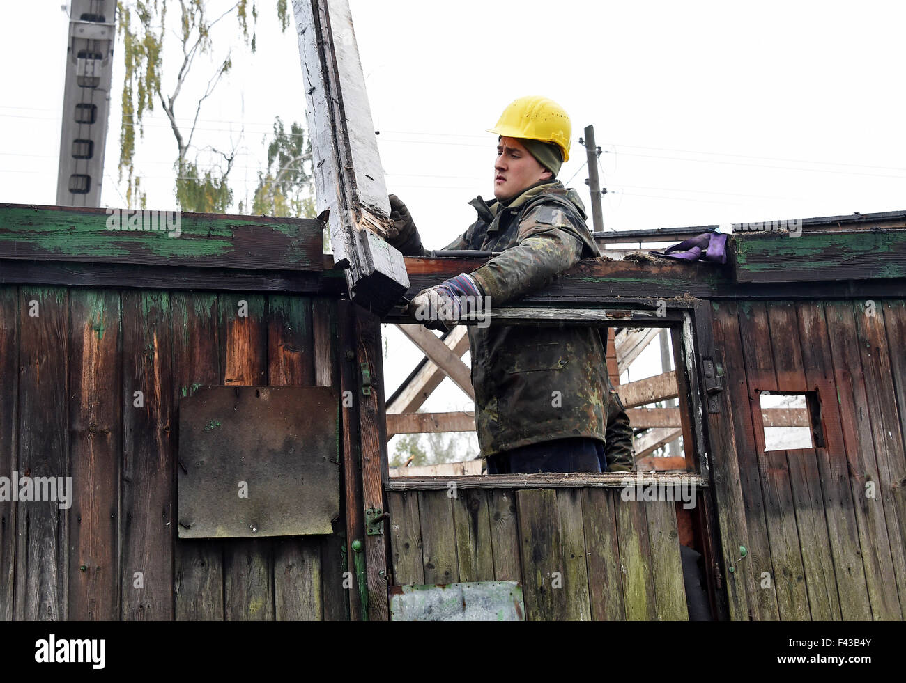 German soldiers dismantle historical POW barracks in Zeithain, Germany ...