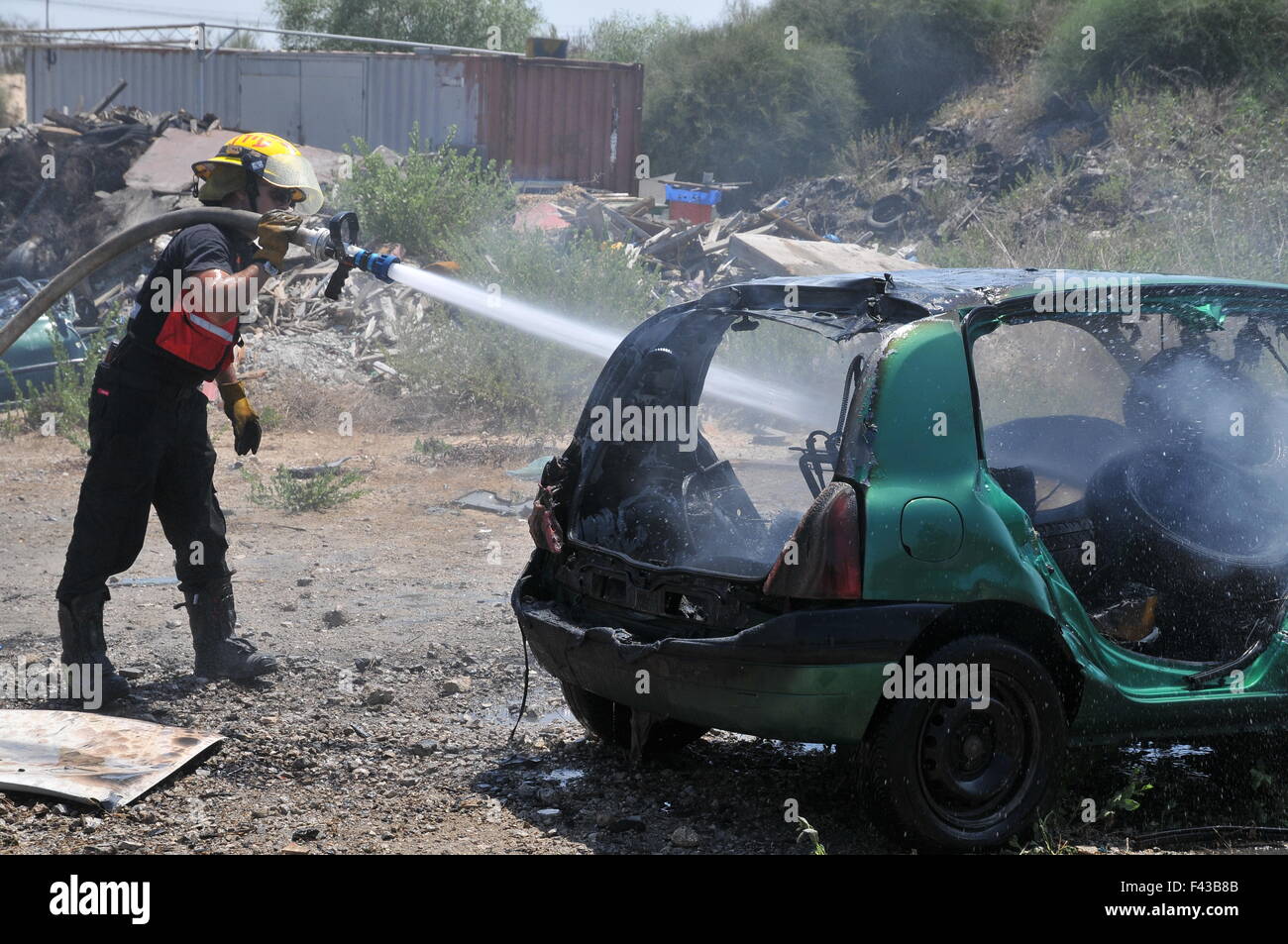 Fire brigade extinguish burning car hi-res stock photography and images ...
