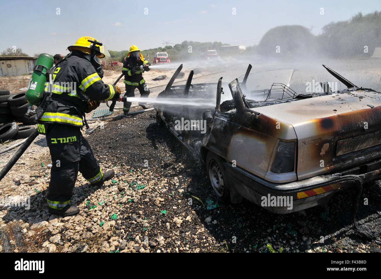 Fire brigade extinguish burning car hi-res stock photography and images ...