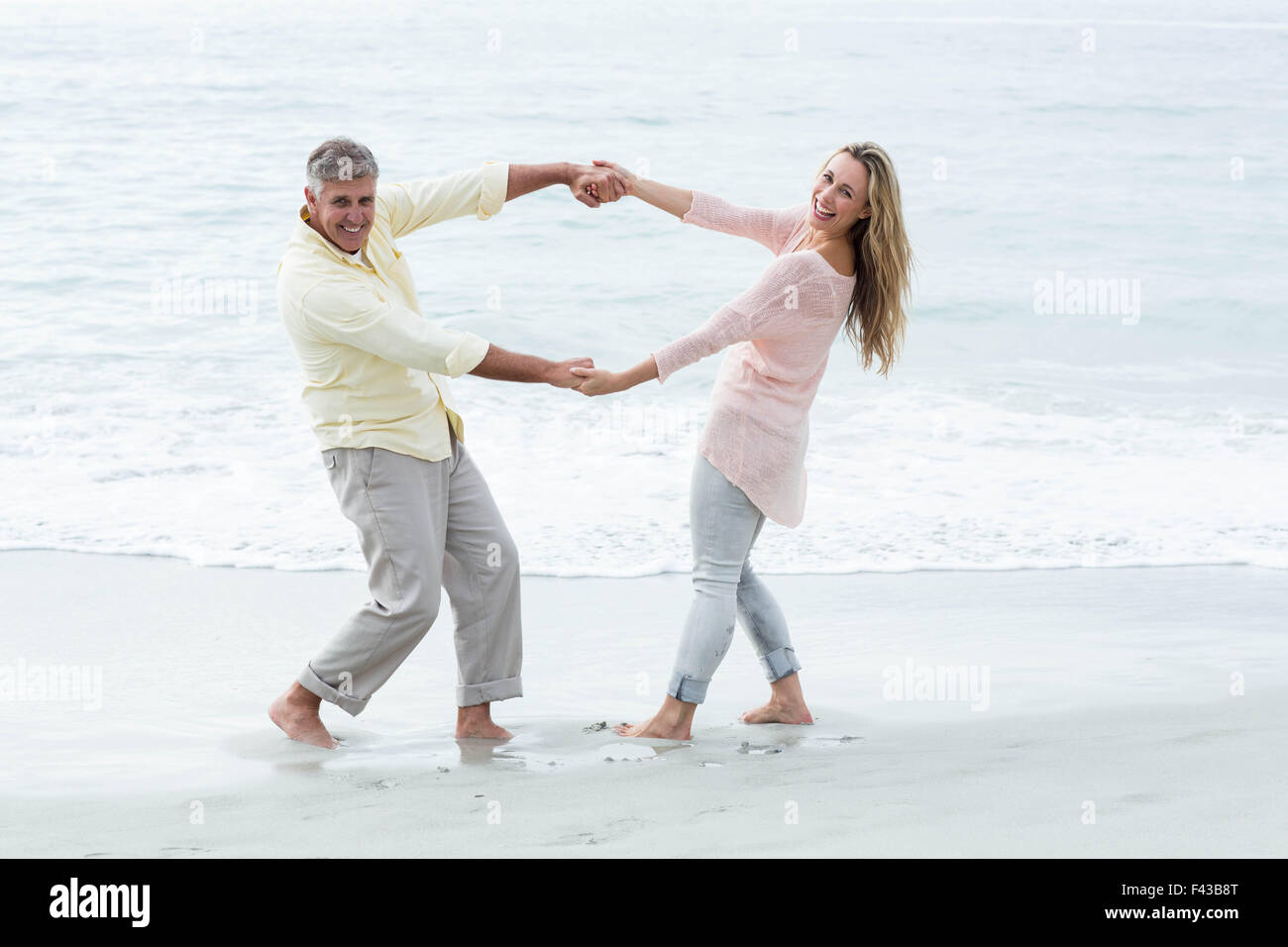 Happy couple having fun together Stock Photo - Alamy
