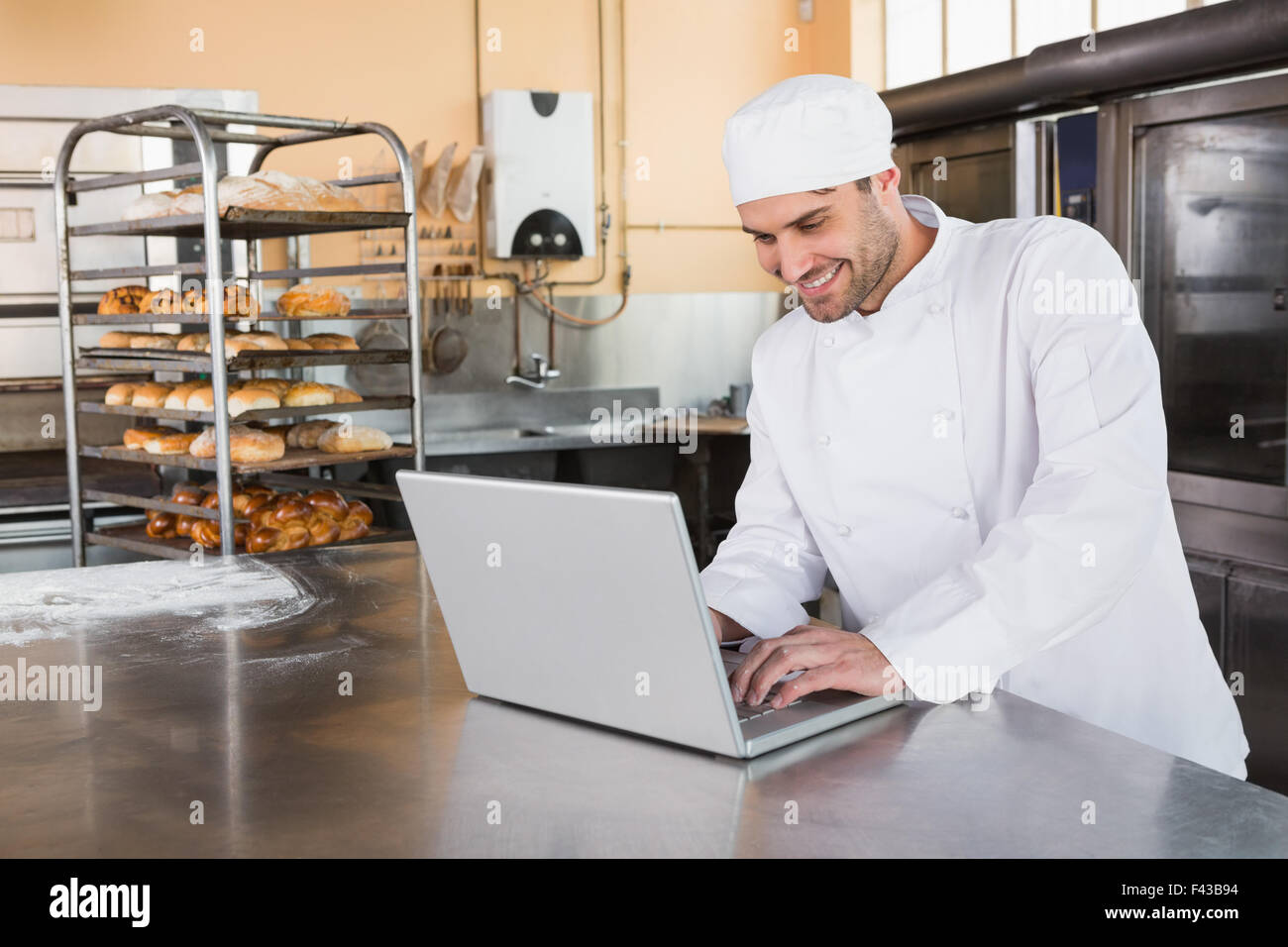 Smiling bakery staff using hi-res stock photography and images - Alamy