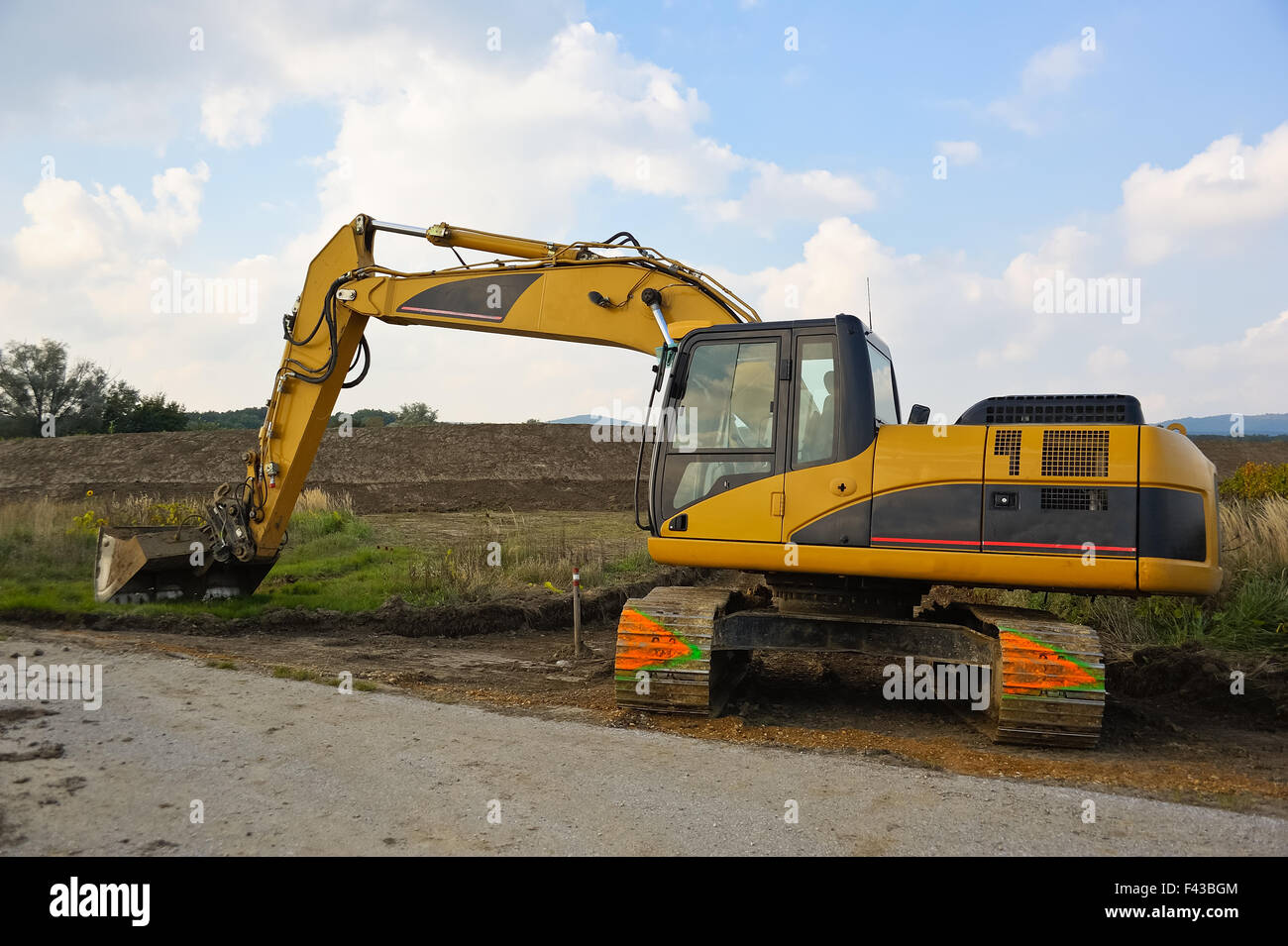 Excavator at Construction Site Stock Photo - Alamy