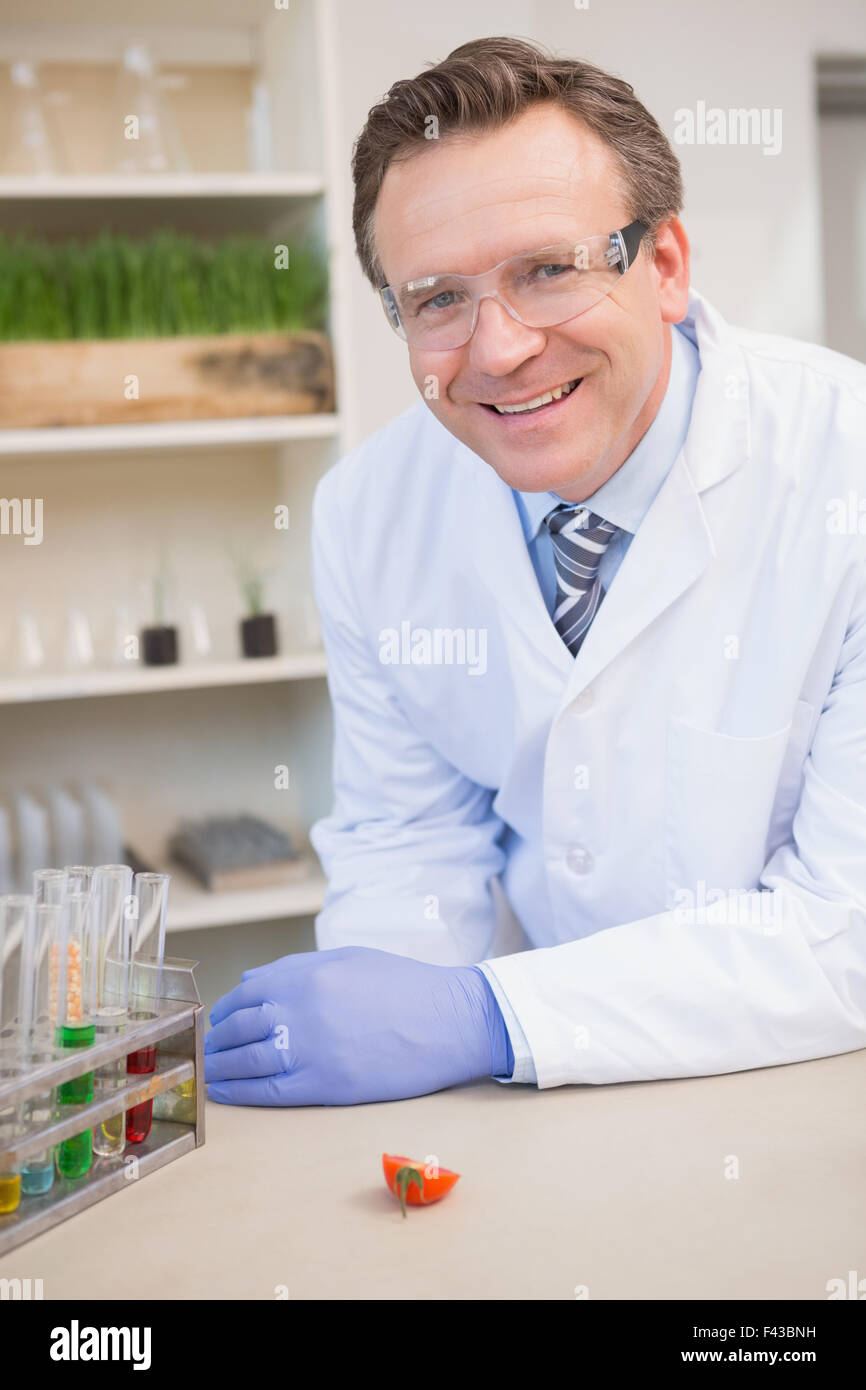 Happy scientist looking at camera Stock Photo - Alamy