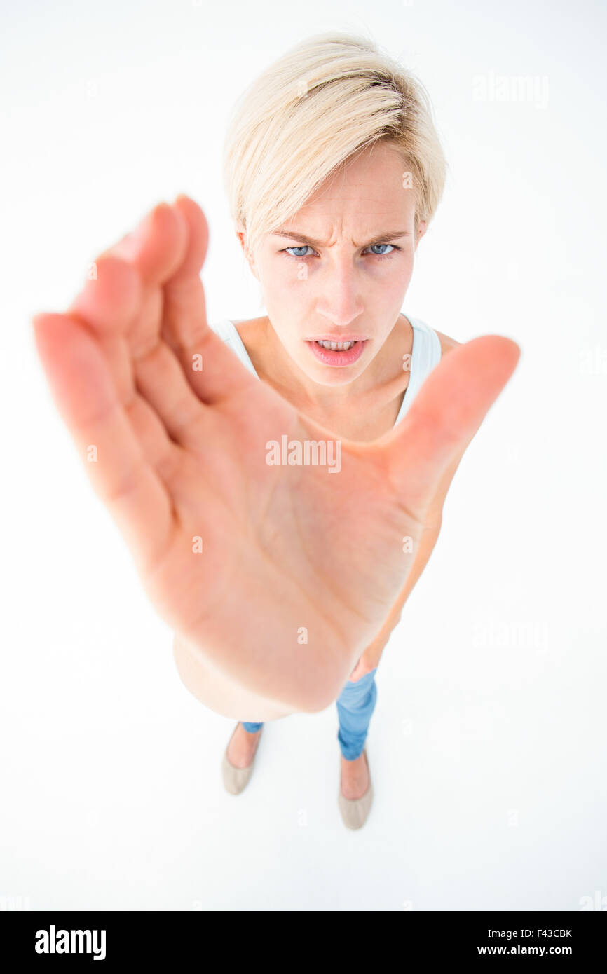 Angry woman taking something Stock Photo - Alamy