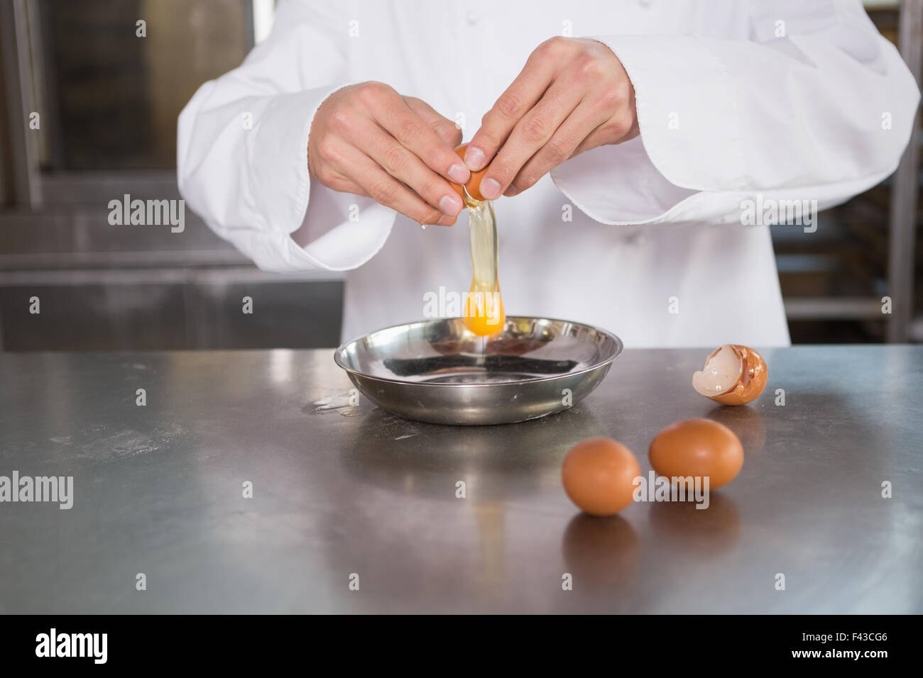 Close up breaking egg hi-res stock photography and images - Alamy
