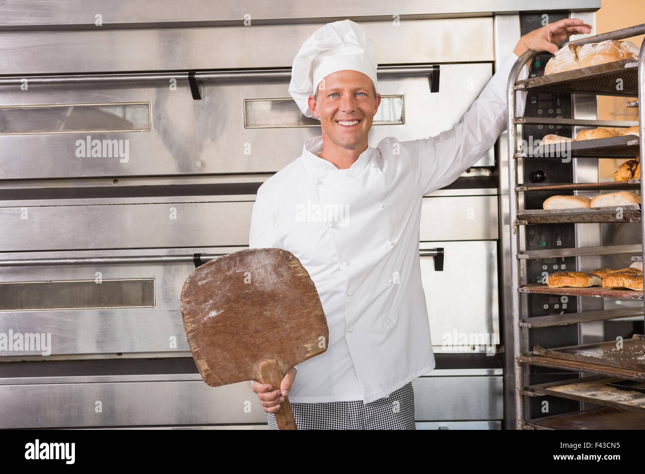 Happy baker hi-res stock photography and images - Alamy