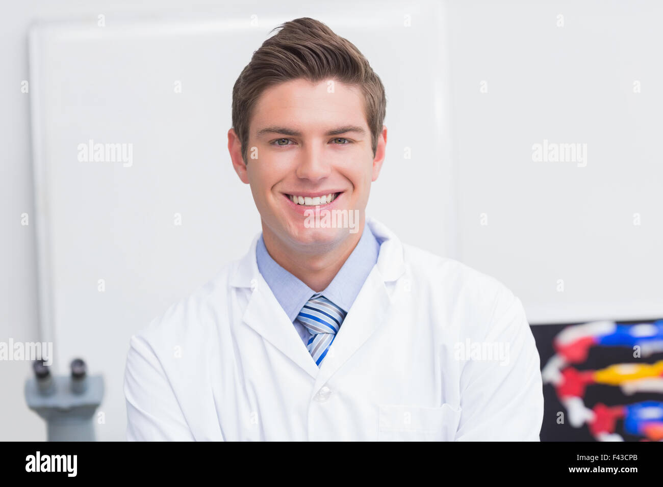 Scientist smiling at camera Stock Photo - Alamy
