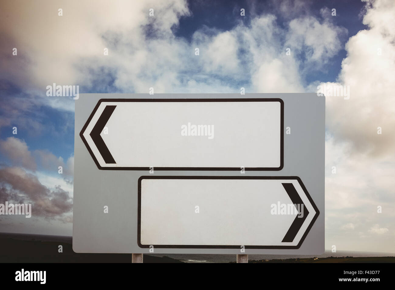 Signpost arrows with copy space Stock Photo - Alamy