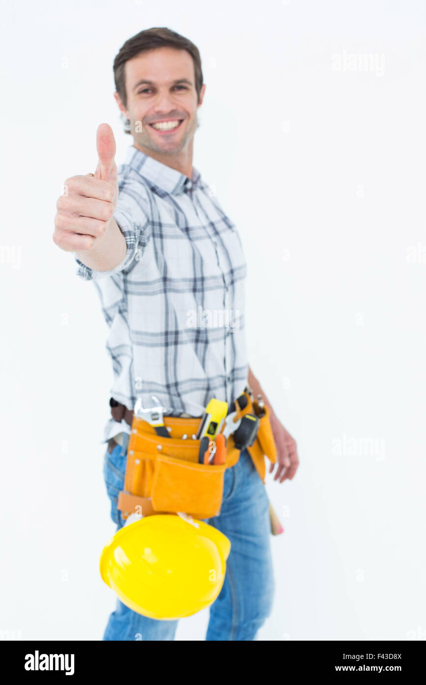 Confident technician gesturing thumbs up Stock Photo - Alamy