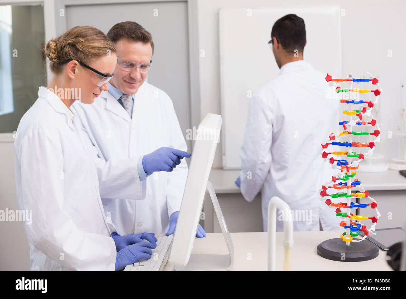 Female scientist computer screen hi-res stock photography and images ...