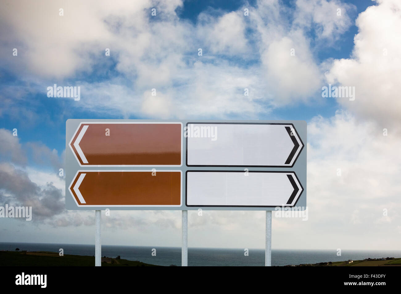 Signpost arrows with copy space Stock Photo - Alamy