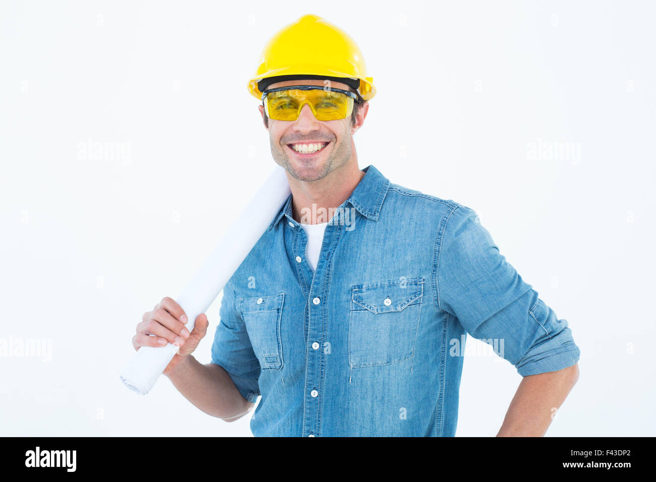 Architect holding rolled blueprint Stock Photo - Alamy