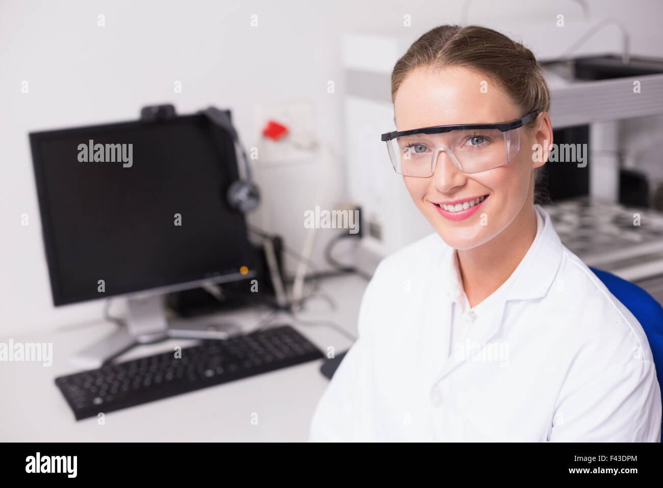 Smiling scientist looking at camera Stock Photo - Alamy