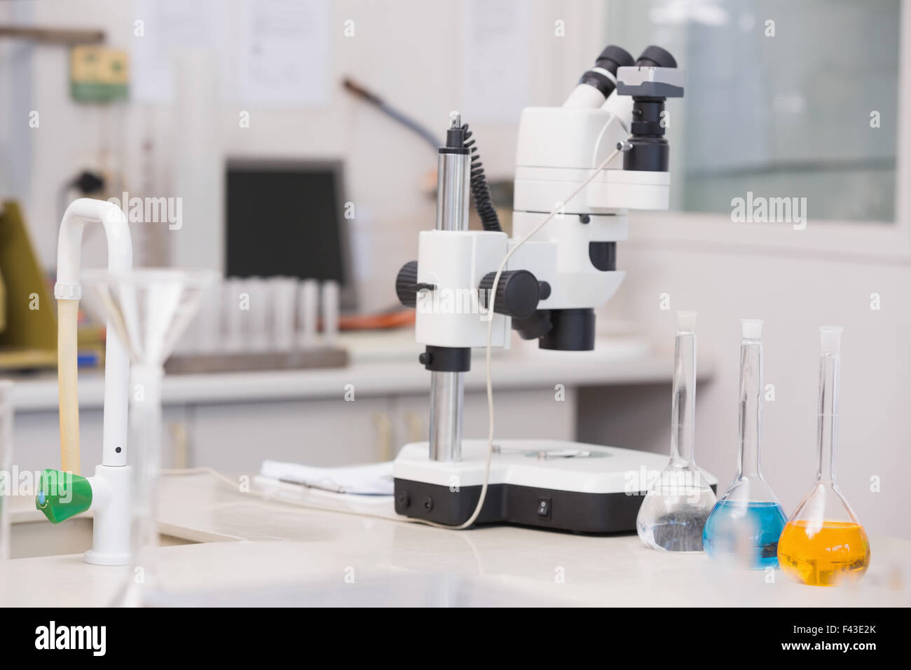 Microscope and beakers hi-res stock photography and images - Alamy