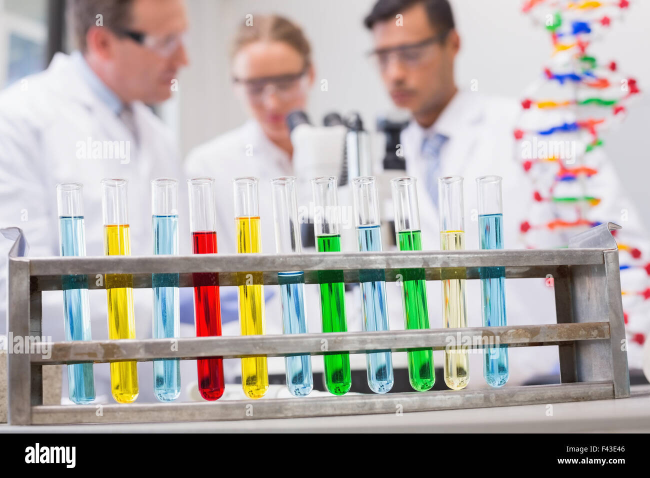 Scientists working attentively with microscope Stock Photo - Alamy Scientists working attentively with microscope Stock Photo - Alamy