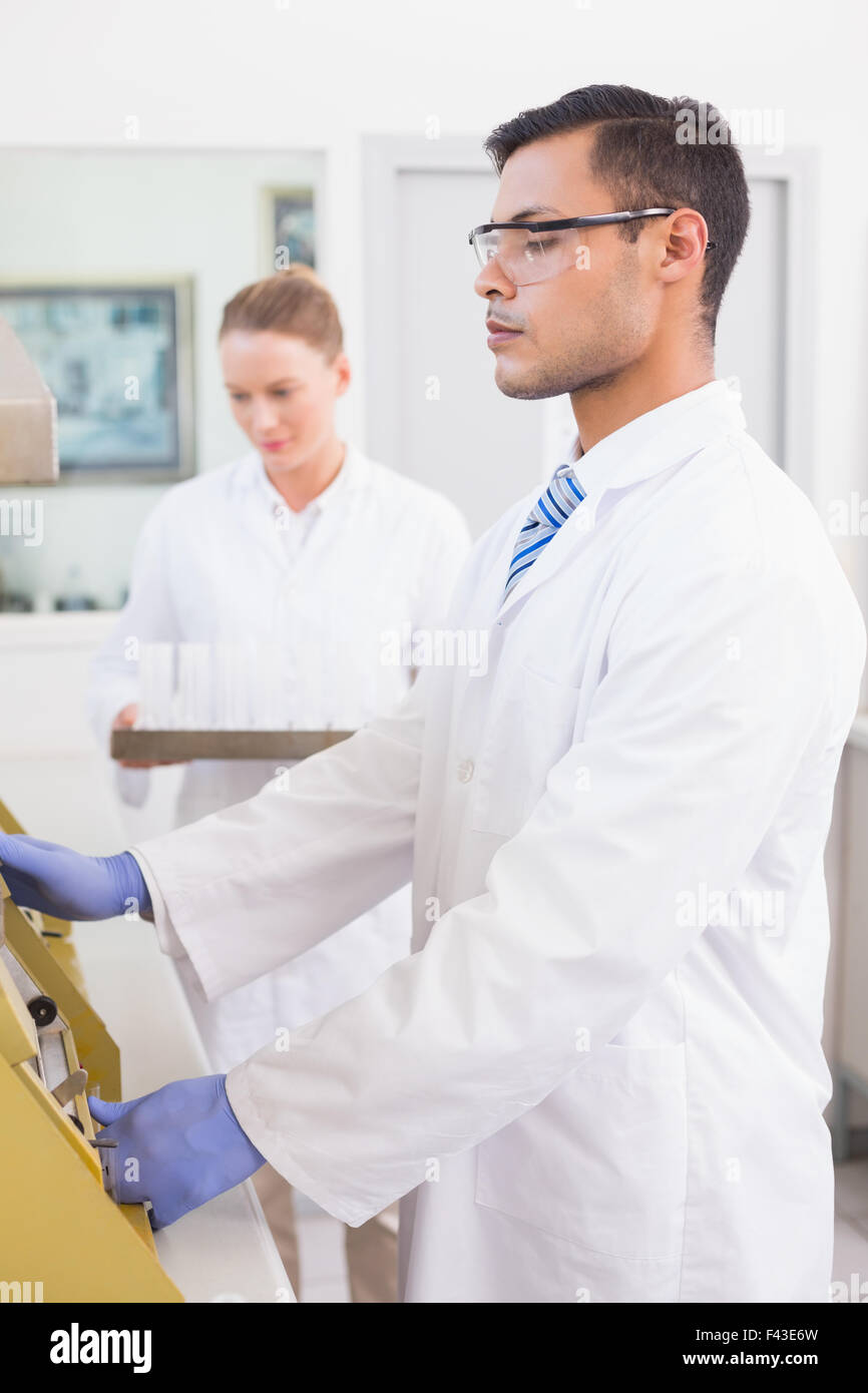 Scientists using technology for research Stock Photo - Alamy