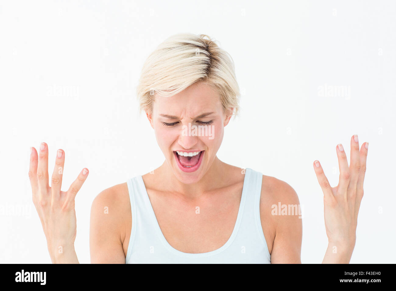 Angry blonde woman gesturing hands hi-res stock photography and images ...