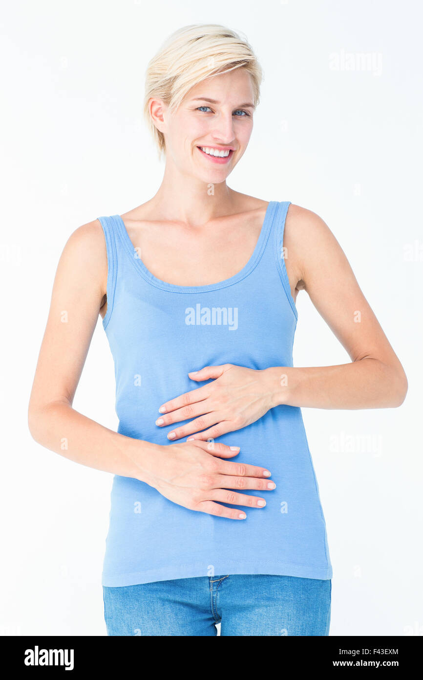 Pretty blonde touching belly hi-res stock photography and images - Alamy