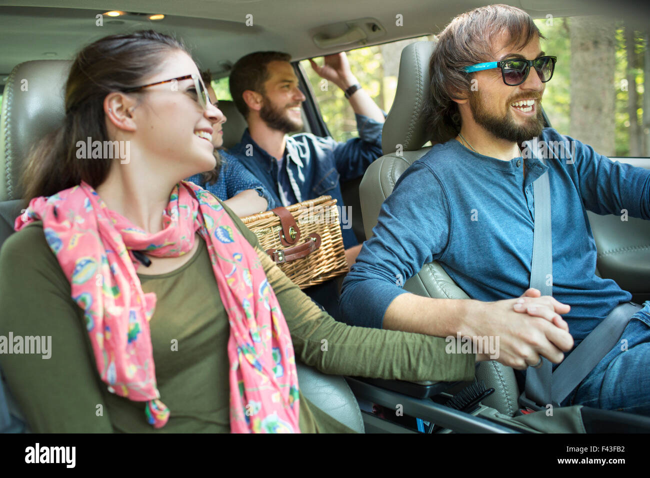 A group of people inside a car, on a road trip Stock Photo - Alamy