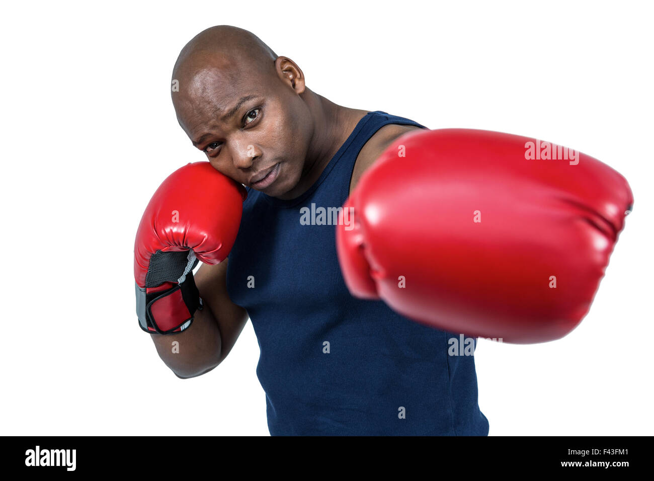Fit man boxing with gloves Stock Photo - Alamy