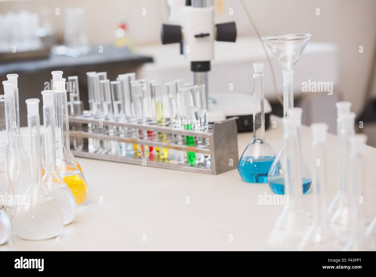 Test tubes with colorful fluid inside Stock Photo - Alamy