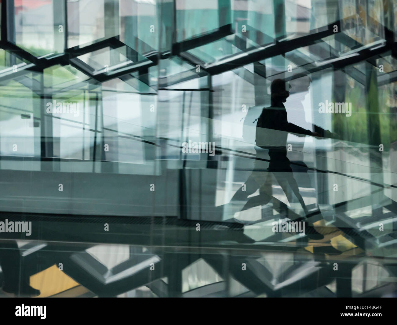Man walking into a building hi-res stock photography and images - Alamy