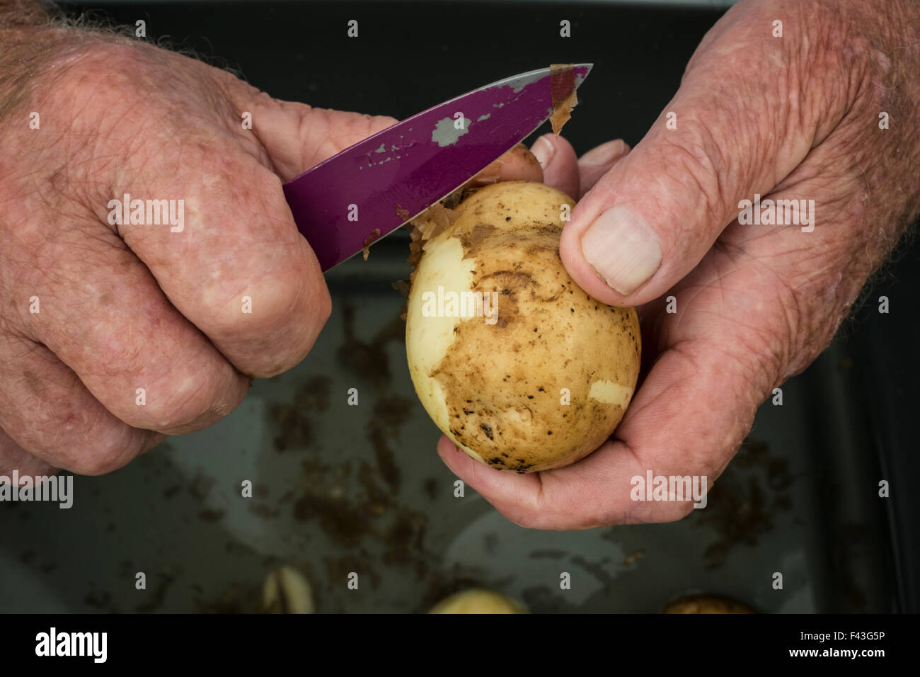 Peeling potato knife hi-res stock photography and images - Alamy