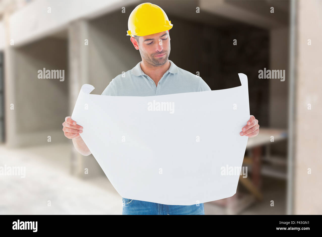 Composite image of architect reading plan Stock Photo - Alamy