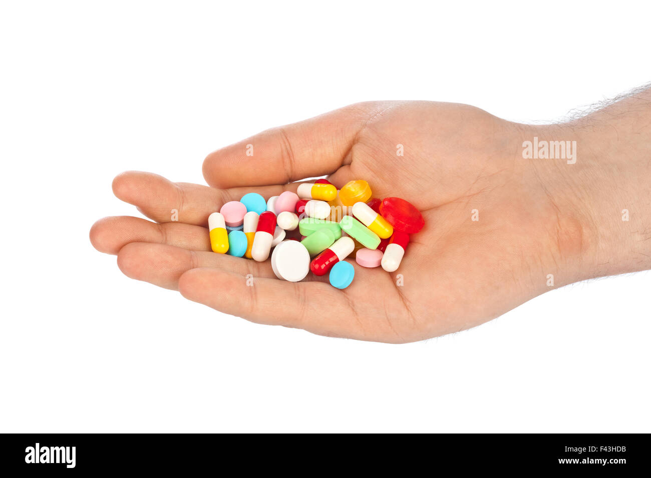 Hand with pills Stock Photo - Alamy