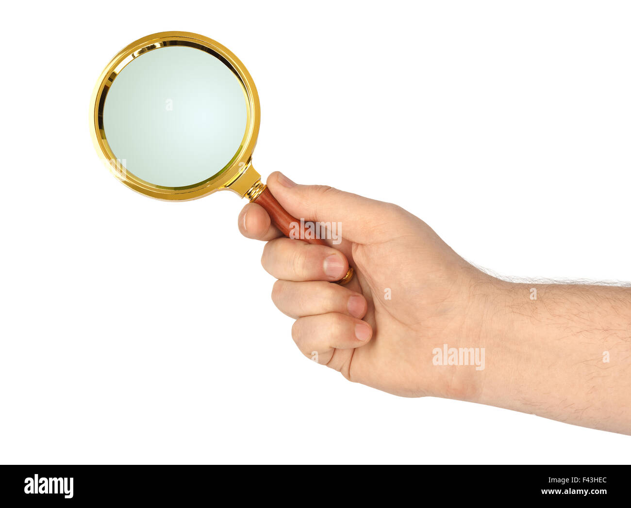 Magnifying glass in hand Stock Photo - Alamy