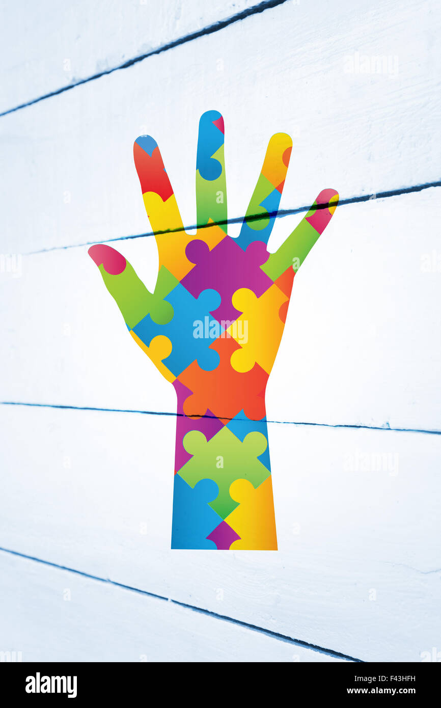 Composite image of autism awareness hand Stock Photo - Alamy