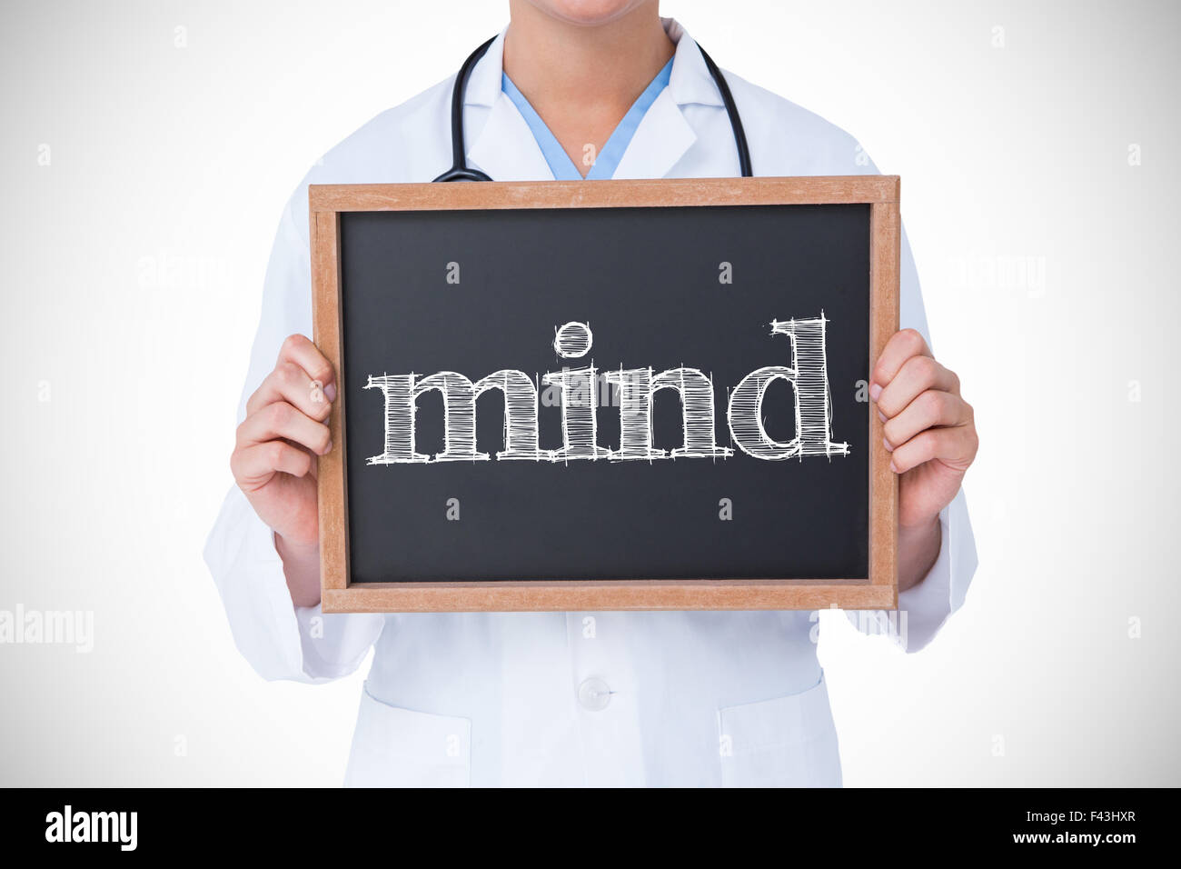 Mind against doctor showing little blackboard Stock Photo - Alamy