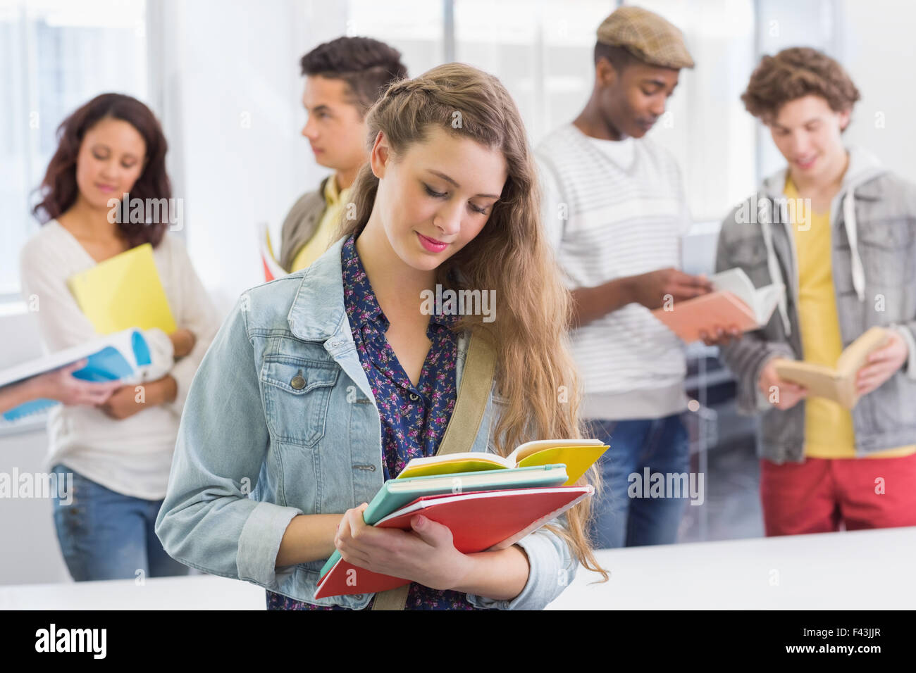 Fashion student reading her notes Stock Photo - Alamy