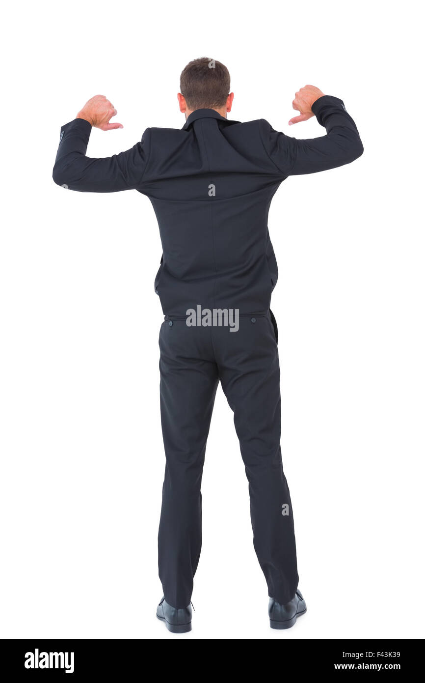 Businessman standing with hands up Stock Photo - Alamy