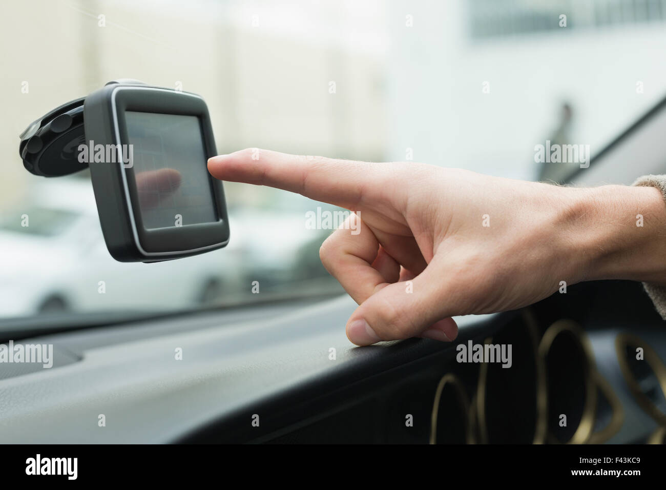 Man using satellite navigation system Stock Photo - Alamy