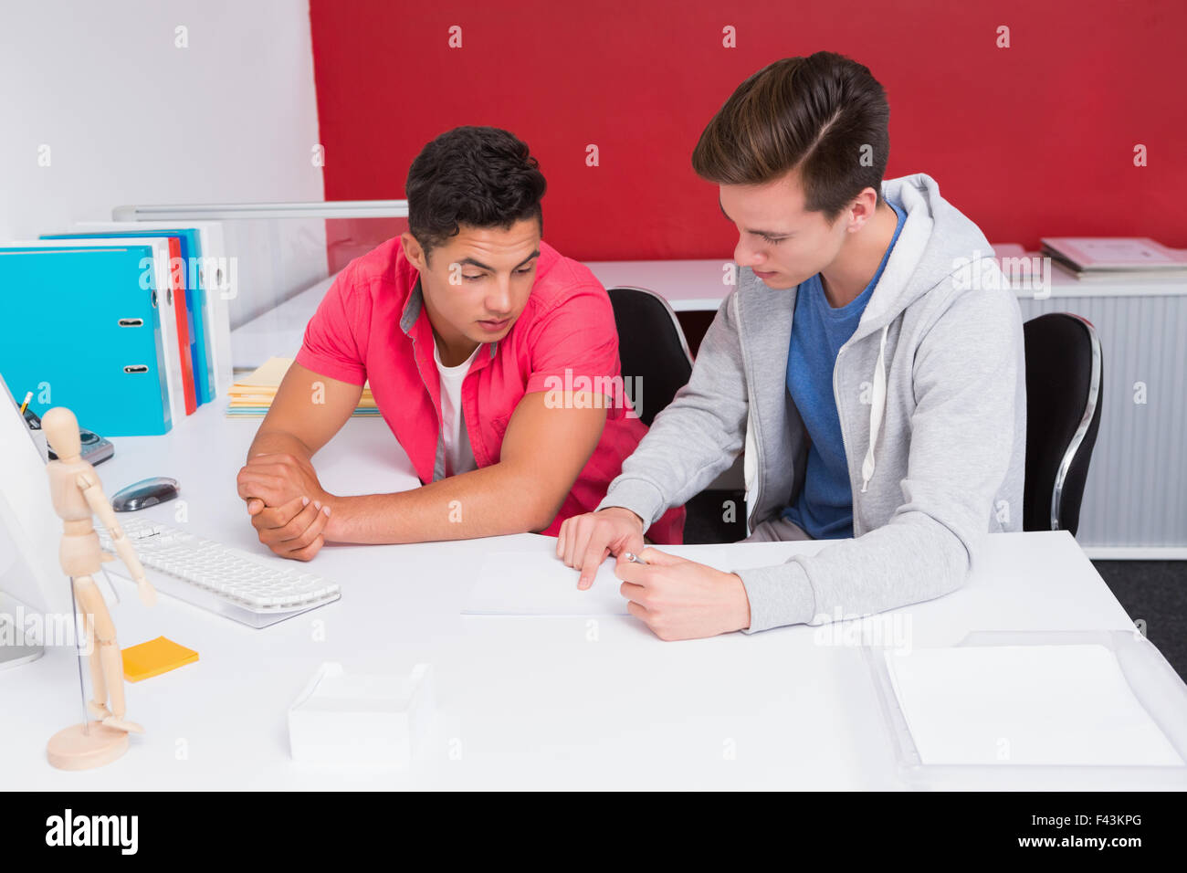 Concentrated students studying together Stock Photo - Alamy