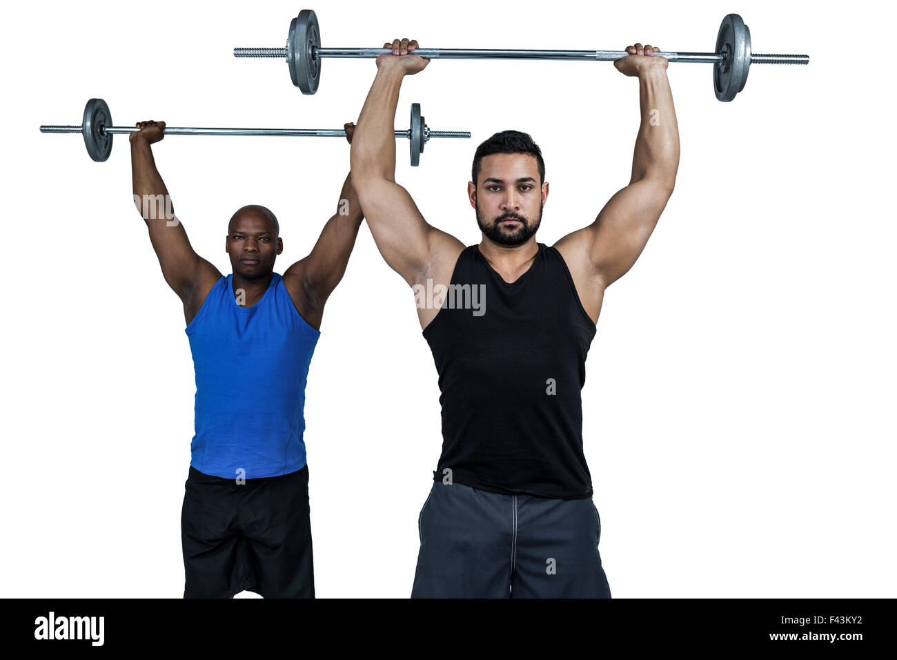 Man lifting barbell with trainer Stock Photo - Alamy