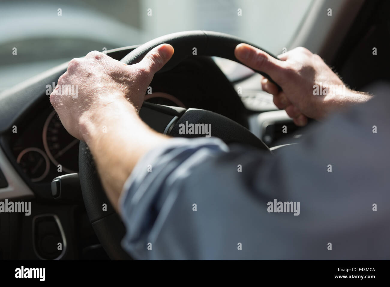 Close up of man holding his wheel Stock Photo - Alamy