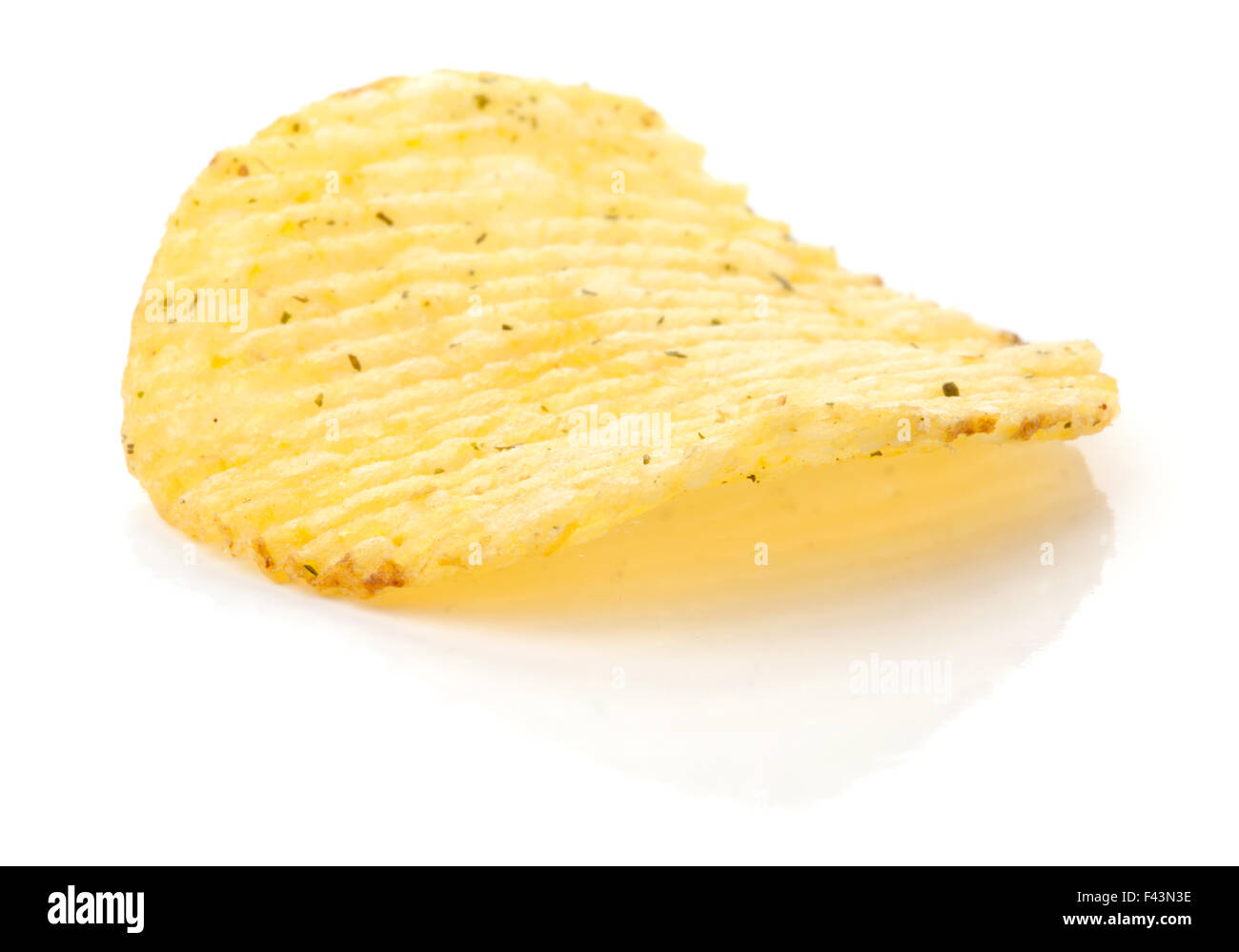 Potato chips with spice isolated on white background Stock Photo - Alamy