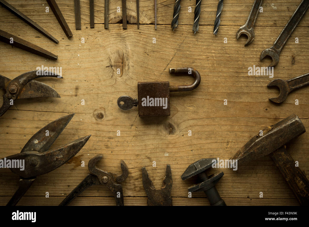 old retro used tools on wooden table Stock Photo - Alamy